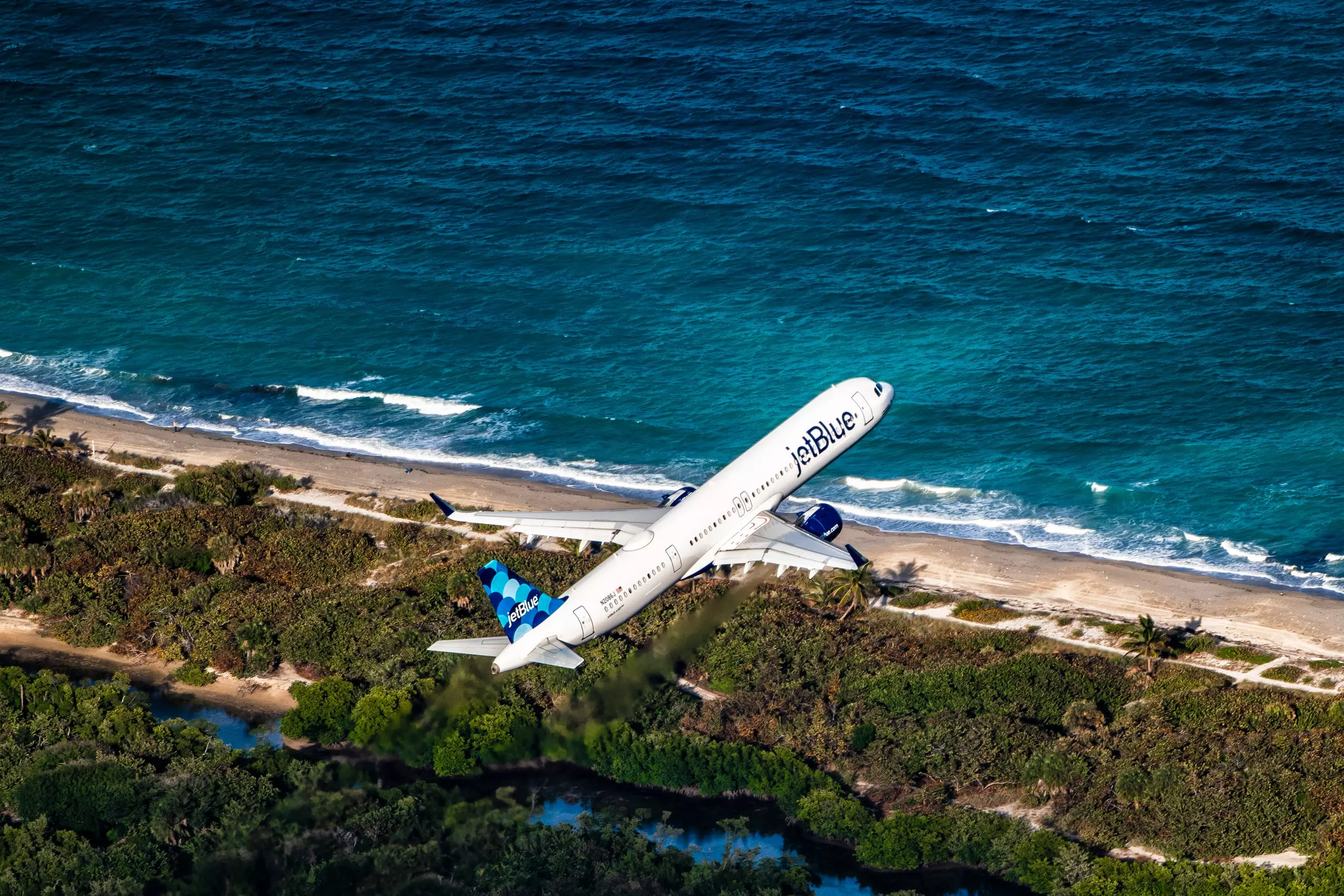 JetBlue TrueBlue پروگرام سان پوائنٽس کي ڪيئن حاصل ڪجي